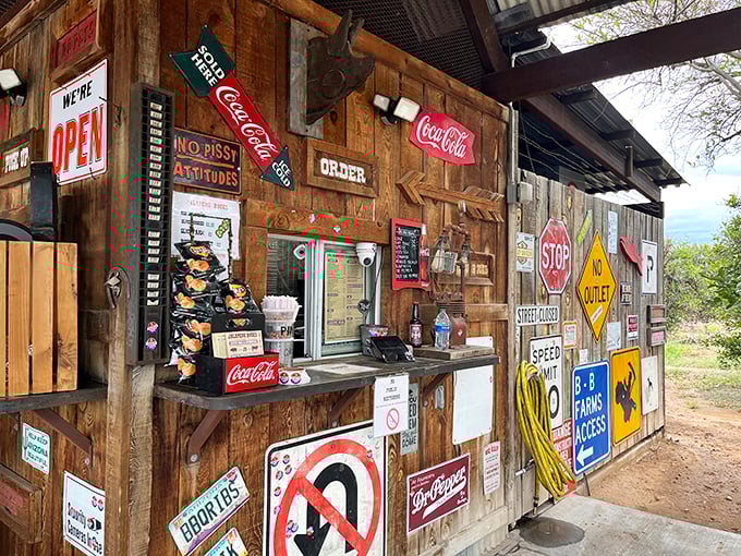 Where the magic begins: this humble counter has launched countless food dreams. The "No Pissy Attitudes" sign isn't just decor—it's a philosophy.