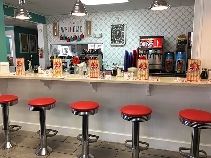 The counter seating – where solo diners become temporary family and the coffee refills flow as freely as the conversation.