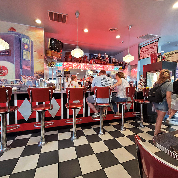 The counter seating isn't just dining—it's dinner theater where you can watch short-order magic happen while perched on those classic red vinyl thrones.