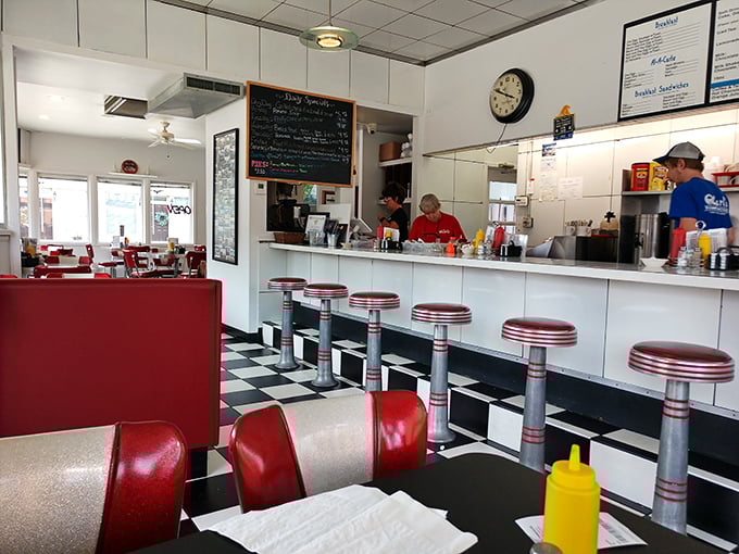 The counter seating—where solo diners become part of the Carl's family and the short-order ballet unfolds before your eyes.