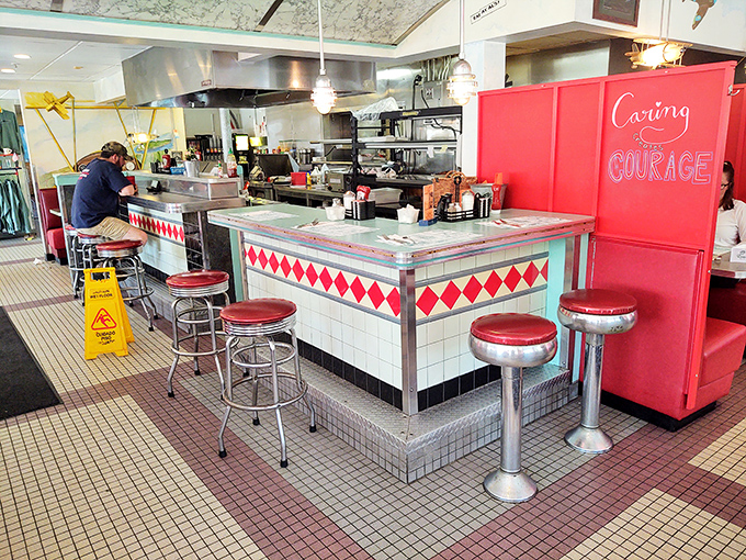 Where the magic happens—the counter seats offer front-row tickets to the choreographed dance of short-order cooking. Worth every penny.