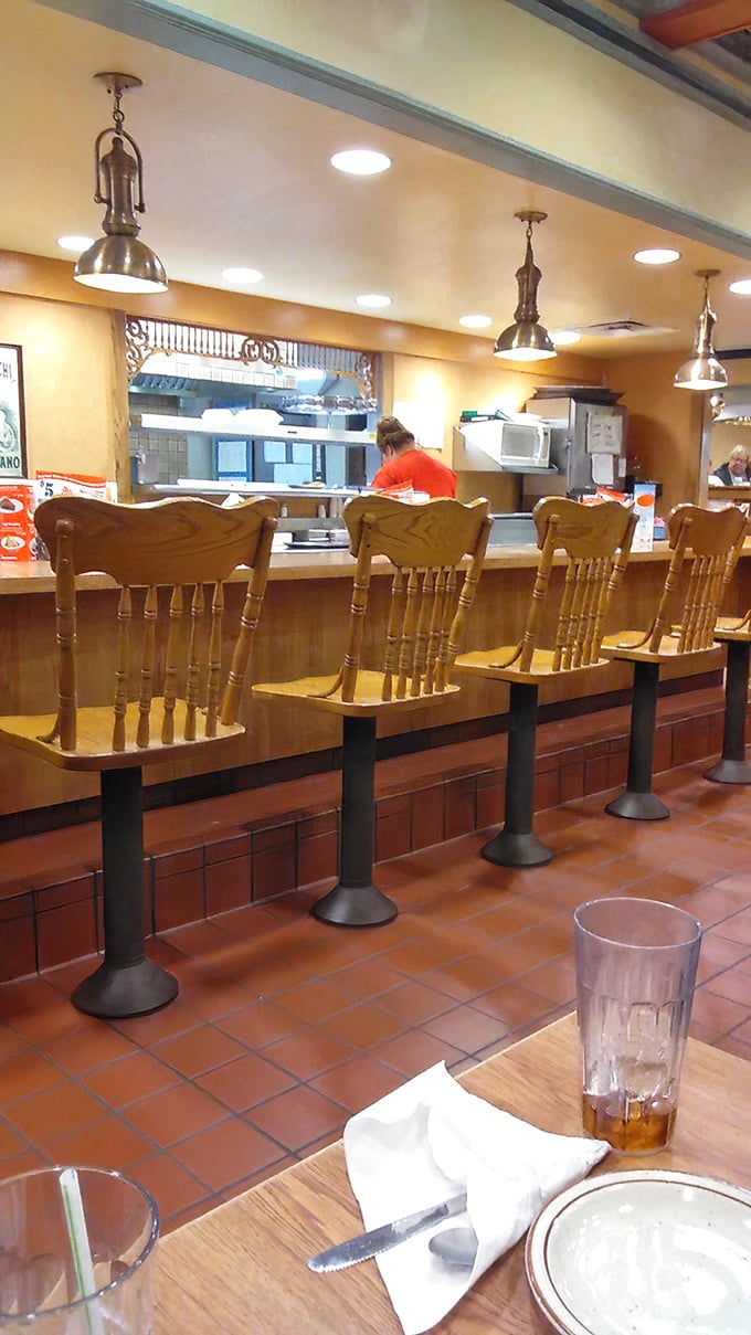 Counter seating: where solo diners become temporary family. Watch the kitchen ballet while perched on wooden chairs that have heard a thousand stories.