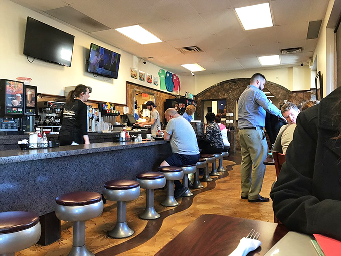 The counter seating area – where regulars become family and first-timers become regulars. The heart of any great diner is this sacred space.