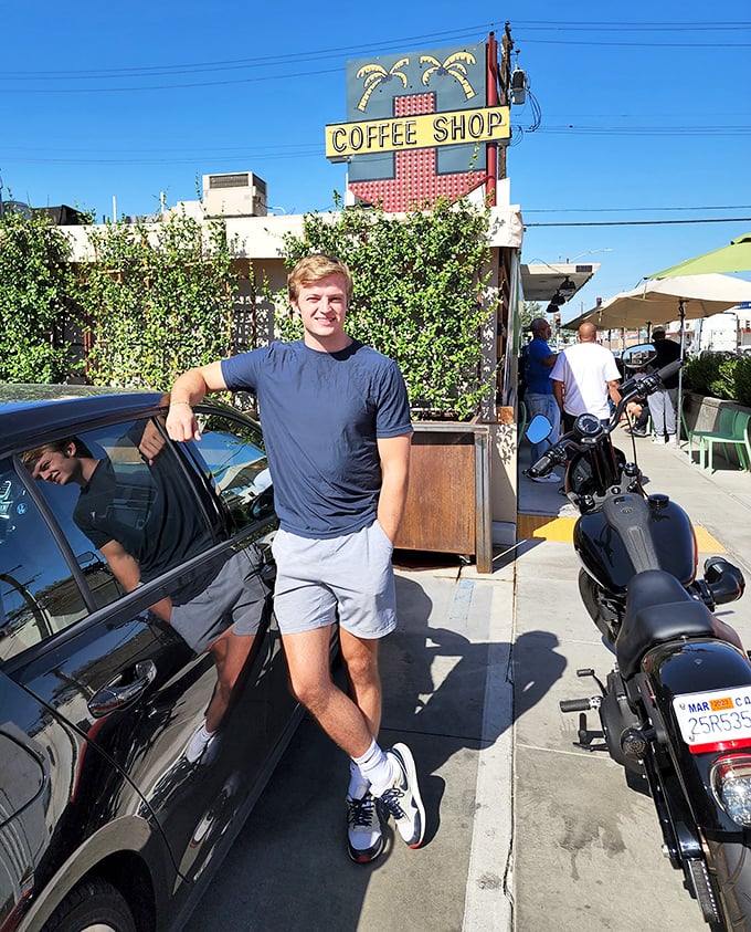 Happy customers pose proudly outside, their smiles telling the real story of this breakfast paradise.