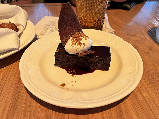 Chocolate decadence that lives up to its name – a dessert so rich it should come with its own tax bracket and investment portfolio.