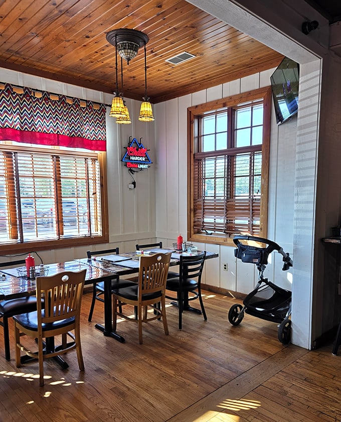 Sunlight streams through wooden blinds onto tables ready for the next round of happy diners. This isn't just a restaurant—it's where memories are made between bites.