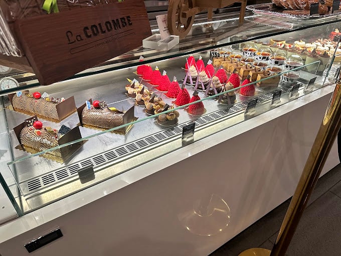 Not just pastries—these are edible jewelry boxes, each one containing treasure for your taste buds. The strawberry tarts practically whisper your name.