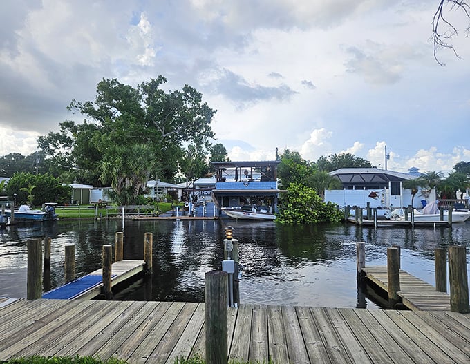 The dock beckons boaters to tie up and dig in. Arrive by water, leave with a full stomach and stories to tell.
