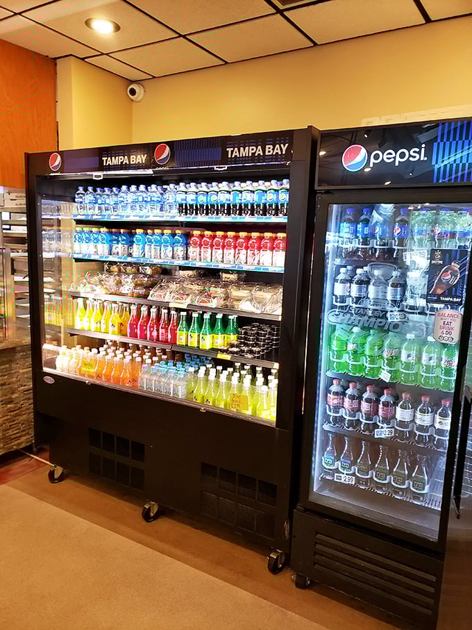 The beverage case – because fighting the Florida heat while enjoying hot pizza requires proper hydration strategy.