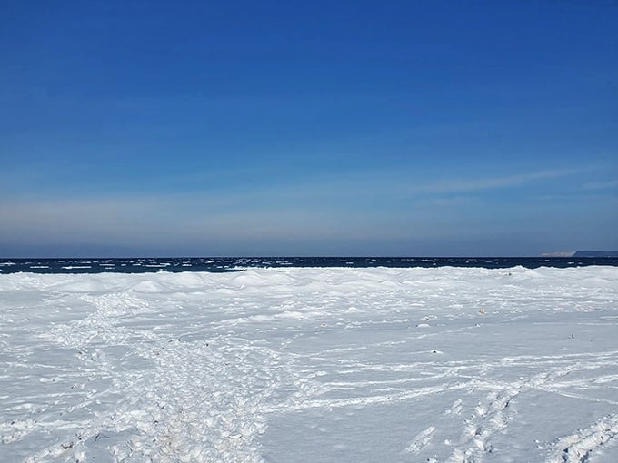 Winter transforms the beach into an arctic wonderland, where ice sculptures created by nature replace summer's sandcastles.