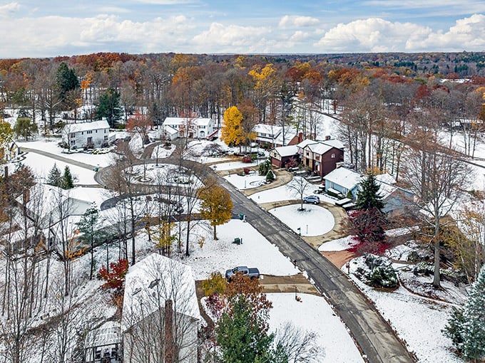Winter in Bainbridge neighborhoods – where snow transforms ordinary streets into Norman Rockwell paintings waiting for children to add footprints.