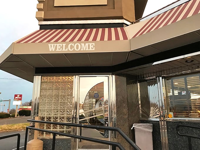 The "WELCOME" awning – not just a greeting, but a promise of the delicious memories you're about to make inside.