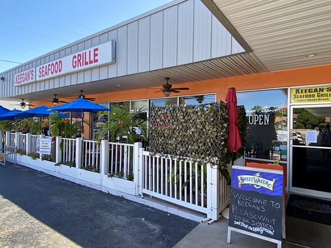 Welcome signs and that white picket fence say "come on in" better than any fancy marketing ever could.
