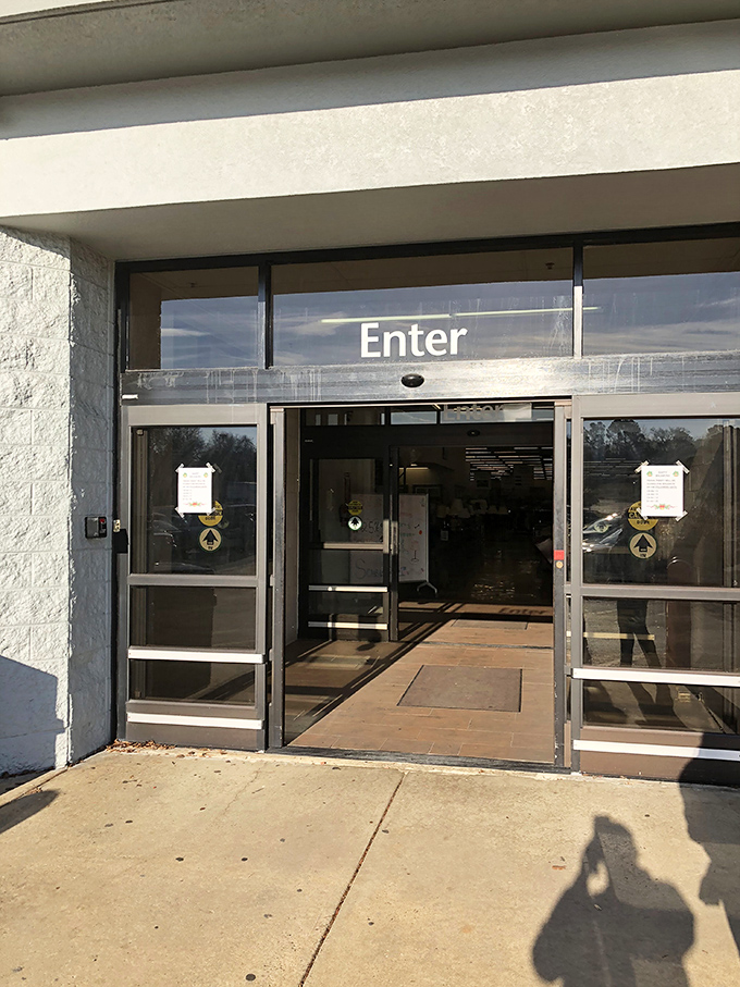 The entrance beckons with a simple invitation: "Enter." Two words would make it perfect: "Bring cash."