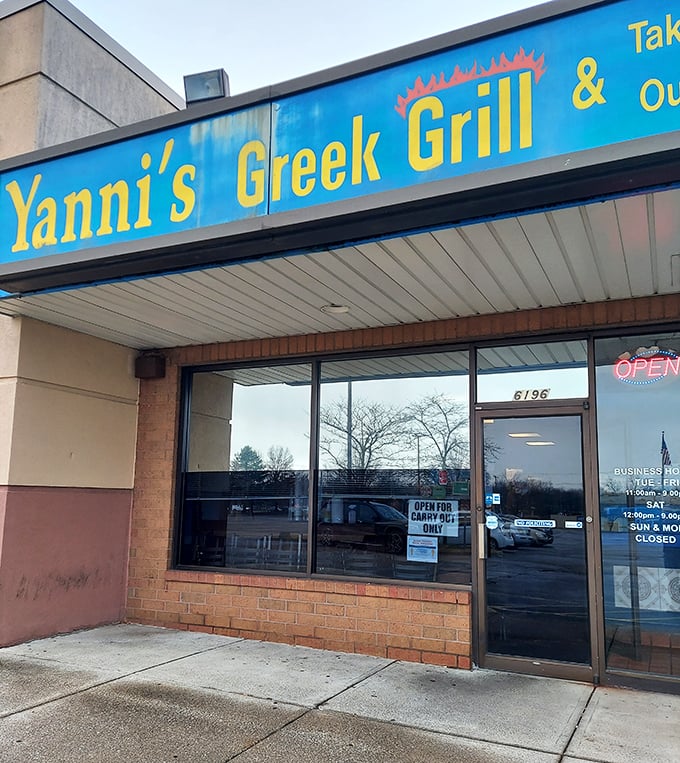 The unassuming entrance belies the flavor explosion waiting inside – proof that you should never judge a gyro by its cover.