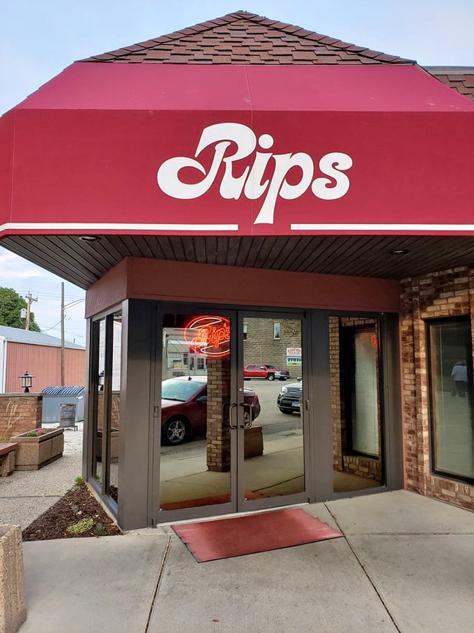 That red awning entrance has welcomed generations of hungry pilgrims. Some things in life are worth the drive—this doorway leads to one of them.