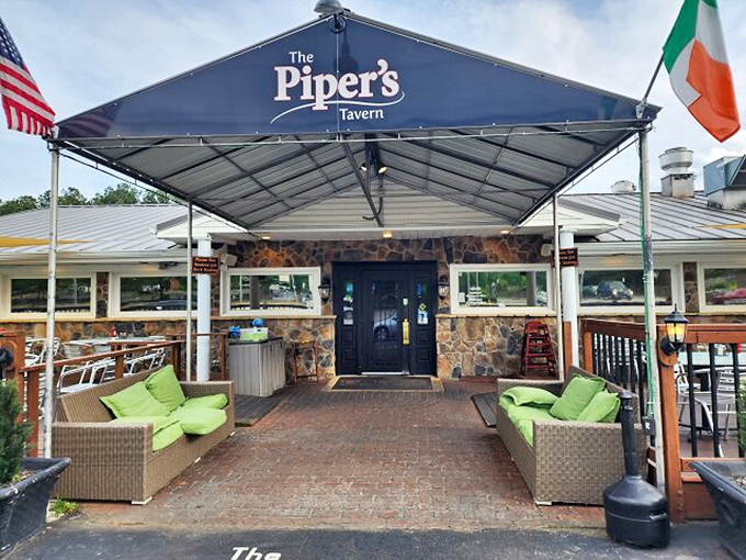 The entrance says it all—Irish flag waving, welcoming canopy overhead, and comfortable seating that whispers, "The outside world can wait; good times are happening here."
