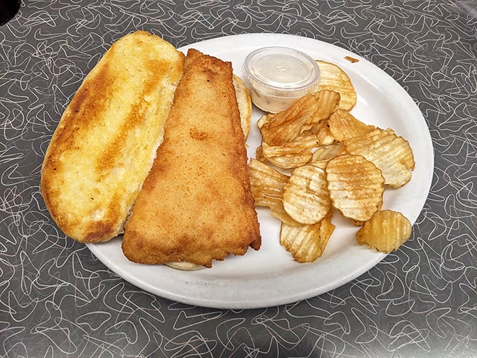 This fish sandwich doesn't need to tell you it's fresh—one bite and you know. Served with chips that snap with satisfying crispness.