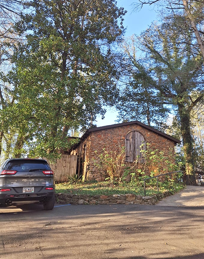 Approaching The Peddler feels like discovering a secret—a stone cottage hiding in plain sight, promising memorable meals under a canopy of trees.