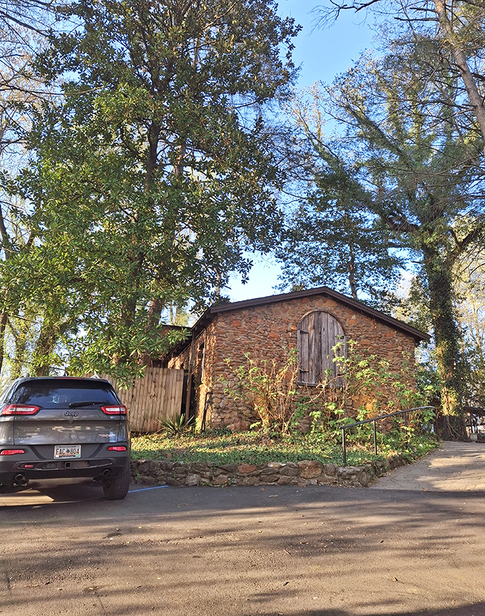 Approaching The Peddler feels like discovering a secret—a stone cottage hiding in plain sight, promising memorable meals under a canopy of trees.
