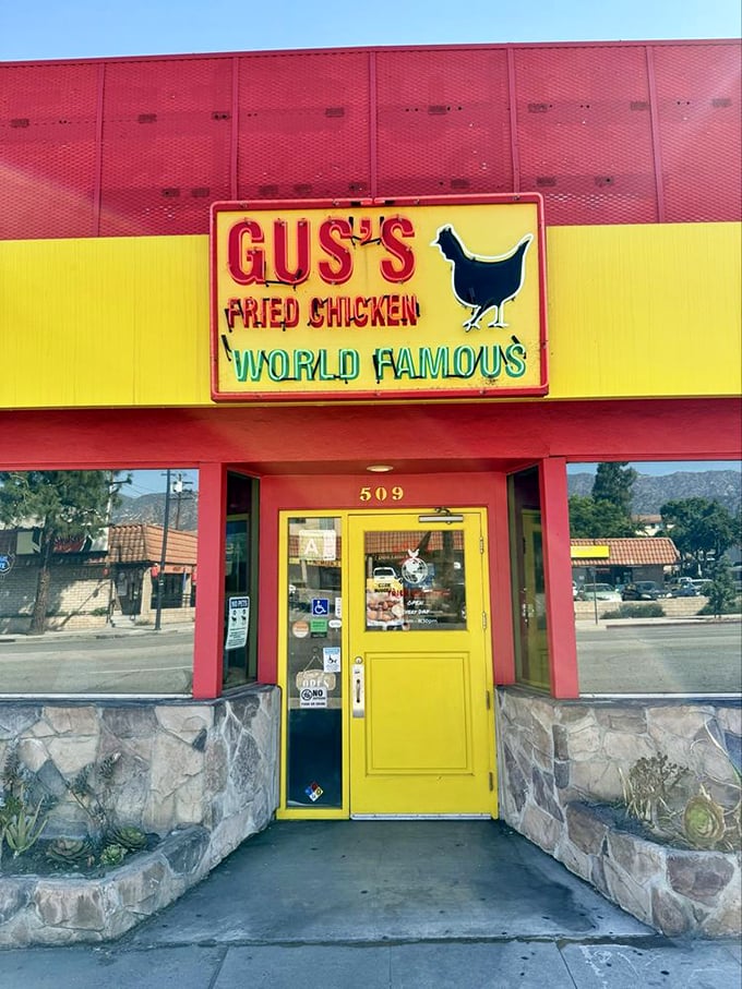 That yellow door might as well be the entrance to Narnia for fried chicken lovers. Step through and enter a world where calories don't count and napkins are essential.