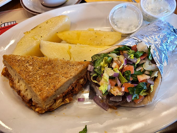 The gyro plate arrives like a Mediterranean vacation on a white plate—no passport required, just an appetite.