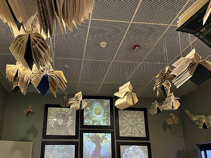 Books don't just contain worlds at Otherworld – they become worlds, suspended in mid-air like knowledge taking flight.