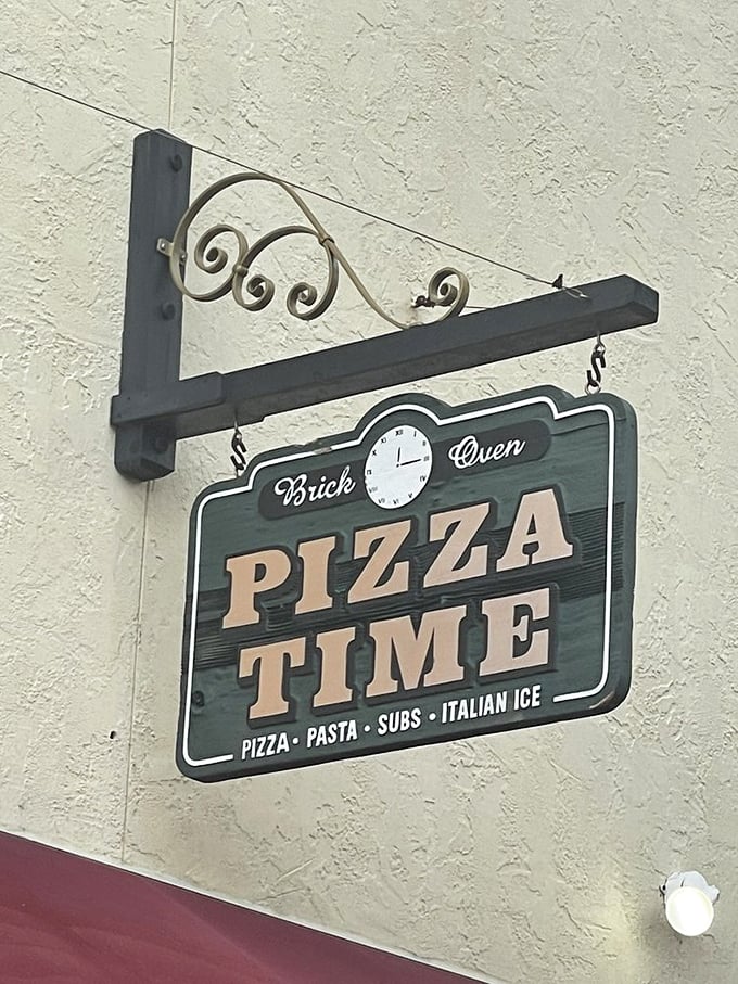 Brick Oven PIZZA TIME—the hanging sign promises exactly what you'll find inside: a timeless experience where the clock is always set to delicious. 