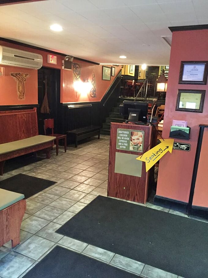 The entrance area welcomes you with practical hospitality. That "Seating" arrow isn't just a direction—it's the first step on your flavor journey.