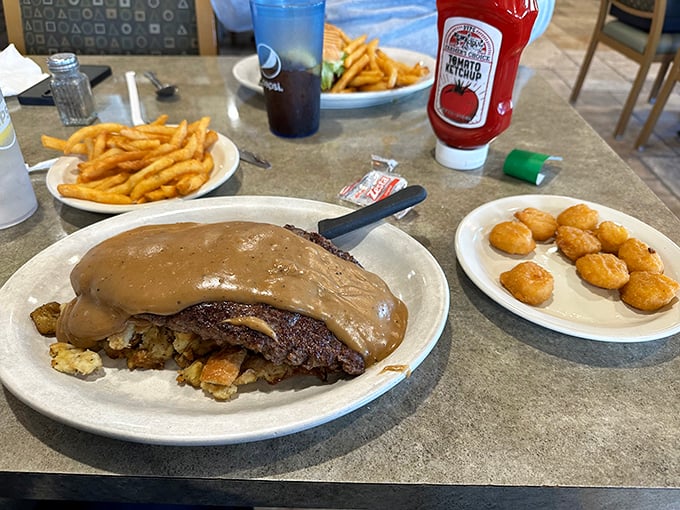 The hot beef platter—where gravy is not just an addition but a philosophy. Comfort food that hugs you from the inside out.