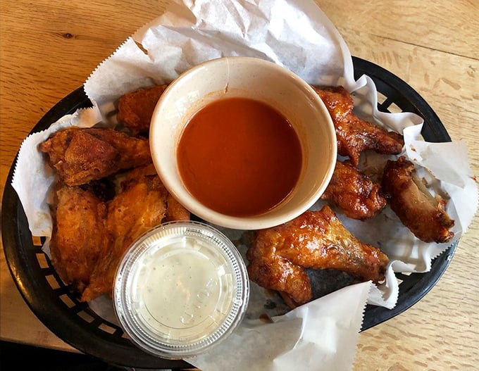 Hot wings that don't need fancy names or gimmicks – just honest heat, smoky flavor, and that sauce you'll be thinking about during your next boring lunch meeting.