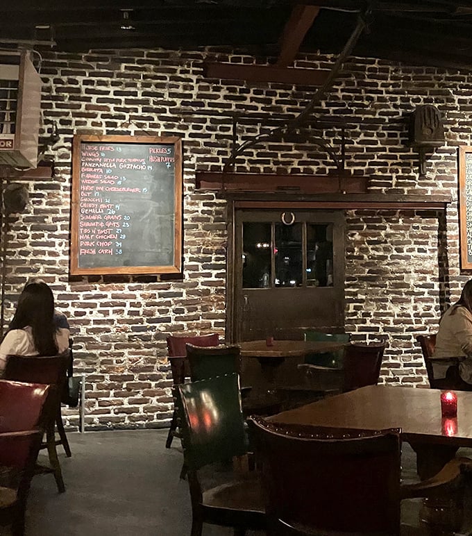 Exposed brick, chalkboard menus, and wooden tables create that perfect blend of rustic charm and culinary sophistication that makes you want to linger just a little longer.