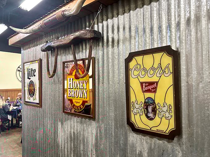 Corrugated metal meets vintage beer signs in decor that doesn't try too hard—it just is, like that comfortable old friend who always tells the best stories.