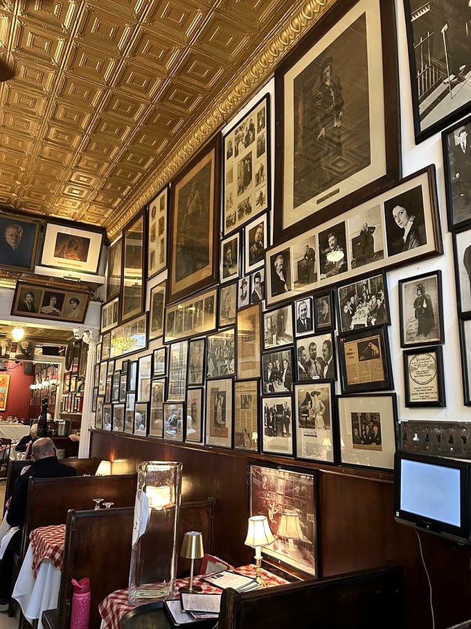 The walls tell stories of musical history – a gallery of operatic legends watching over your meal like old friends sharing your table.