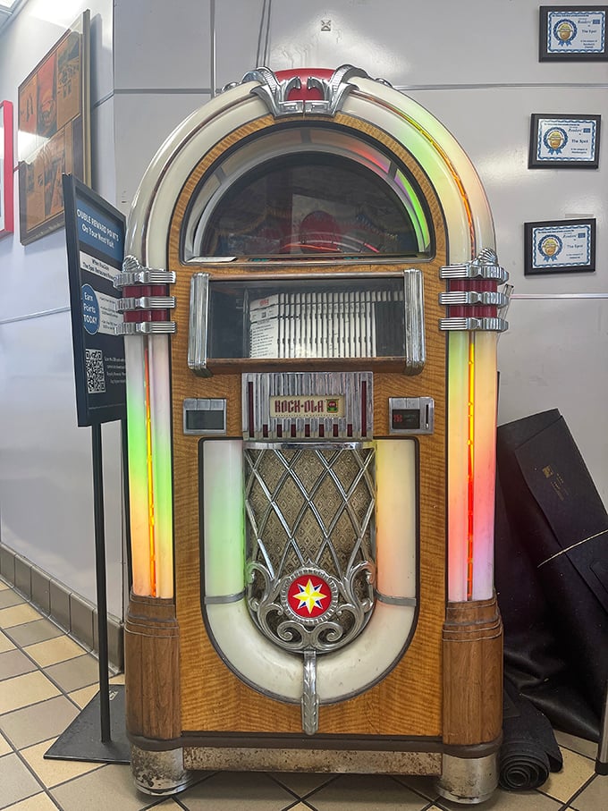 This isn't just any jukebox—it's a time machine disguised as a music player, ready to transport diners back to poodle skirts and sock hops with the press of a button.