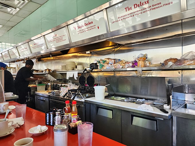 The kitchen ballet—where short-order cooks perform culinary choreography that turns simple ingredients into the comfort food masterpieces that keep us coming back.