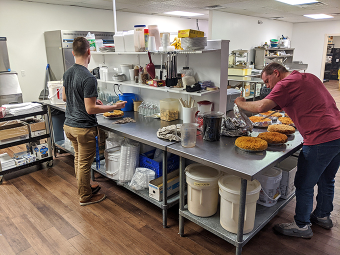 Behind the scenes magic – where skilled hands transform basic ingredients into the legendary pies that have made this Rolla institution famous.