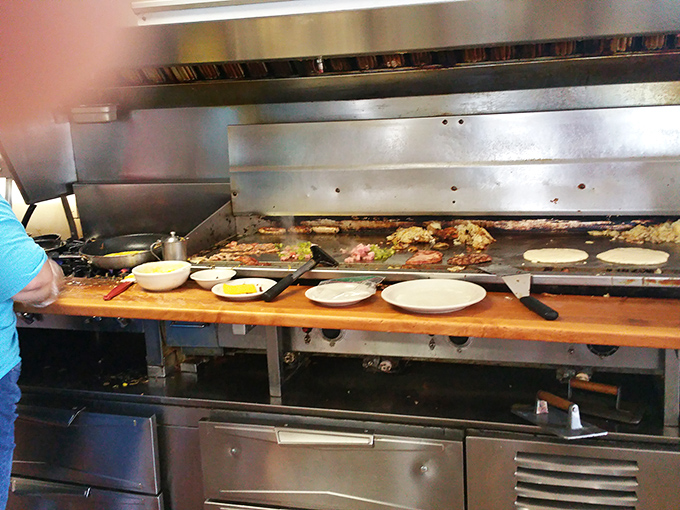The flat-top grill – hallowed ground where breakfast meets lunch in a sizzling symphony conducted by spatula-wielding maestros.