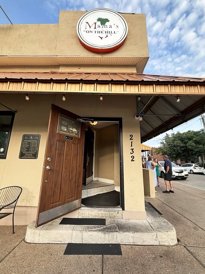 The entrance that's welcomed generations of pasta lovers. That logo of Italy tells you everything: authentic flavors await just beyond those doors.