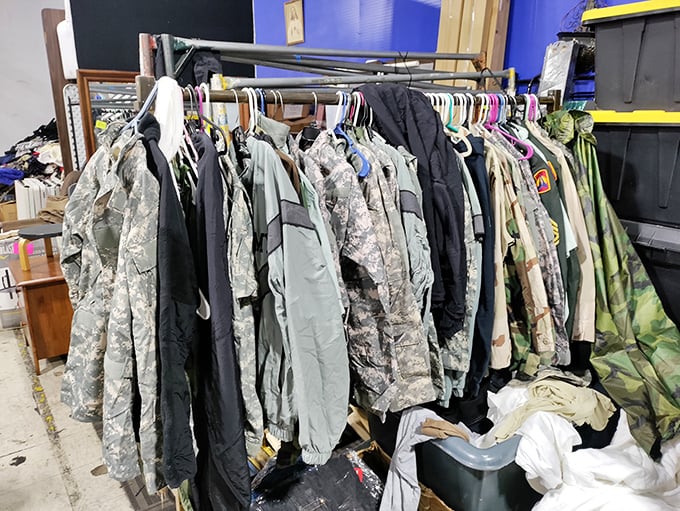 Military surplus gear hangs with utilitarian grace—clothing built to withstand basic training now ready for your weekend projects.