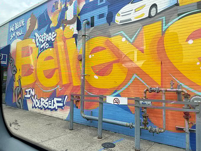 "Prepare to Believe in Yourself!" The mural outside reminds you that thrifting isn't just shopping – it's an act of creative optimism.