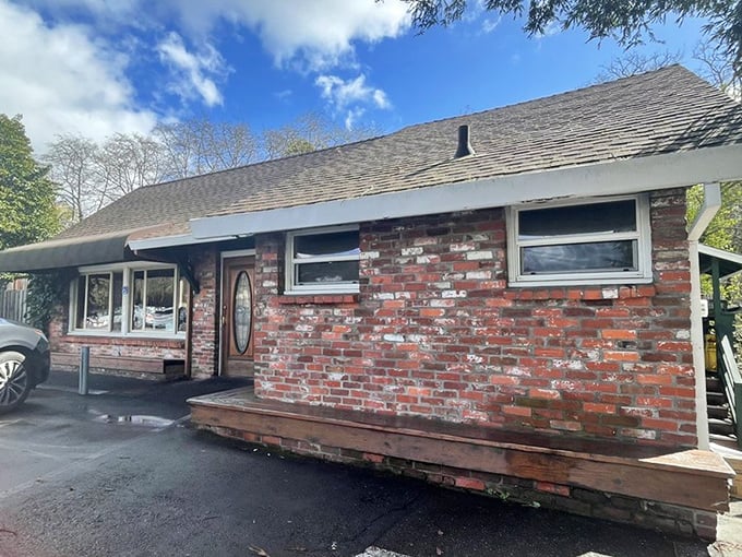 Brick exterior that's weathered California seasons while protecting precious breakfast treasures within. Architectural equivalent of comfort food.