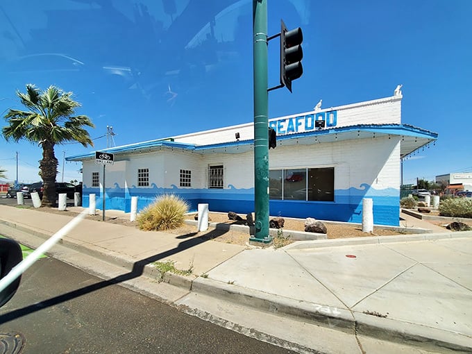 The blue and white exterior stands like a maritime mirage in the desert landscape. A beacon of seafood hope on a Phoenix street corner.