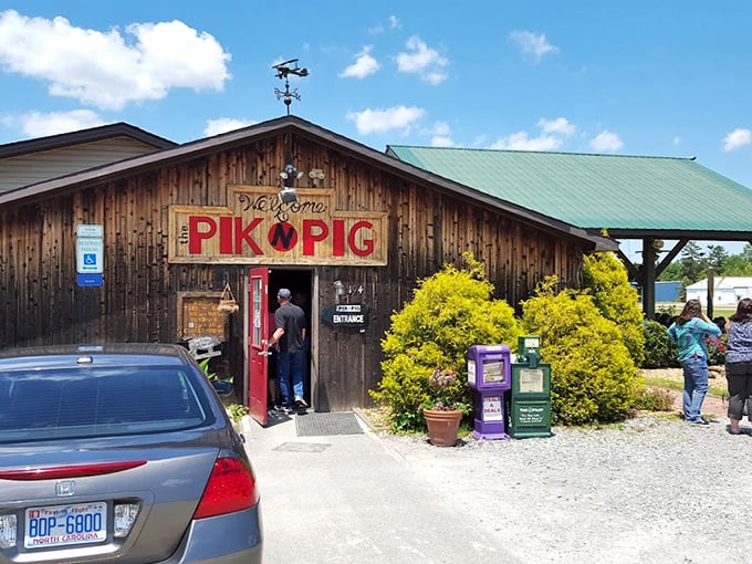 Sunshine, blue skies, and the promise of barbecue. This entrance isn't just welcoming you to lunch—it's inviting you to a North Carolina tradition.