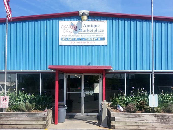 The welcoming entrance promises adventures within—those wooden planters have greeted thousands of visitors who arrived looking for a lamp and left with three chairs and a butter churn.