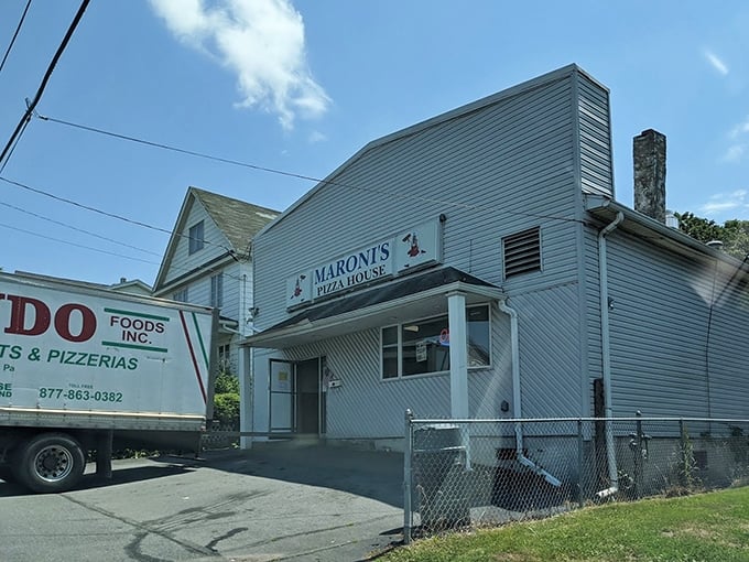 From this humble building flows a steady stream of pizza happiness, proving that greatness doesn't require fancy facades or trendy locations.