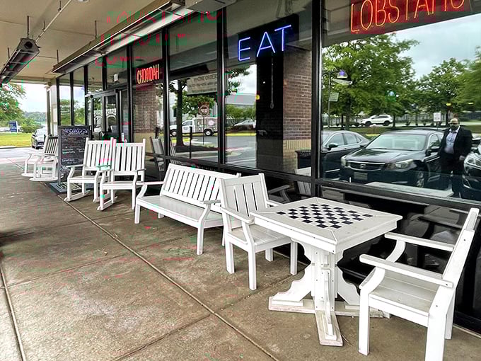 The neon "EAT" sign doesn't mince words – direct and to the point, much like the straightforward deliciousness waiting inside this seafood haven.