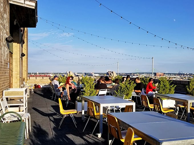 Sunset dining on the rooftop—where string lights compete with city views and the only thing more impressive than the scenery is what's on your plate.