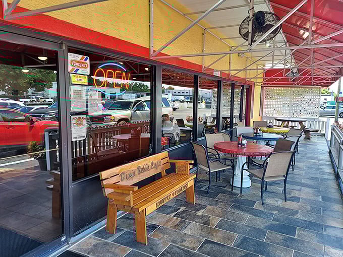 The outdoor seating area—where Florida's morning sunshine meets the aroma of bacon and coffee. Nature's perfect dining room.