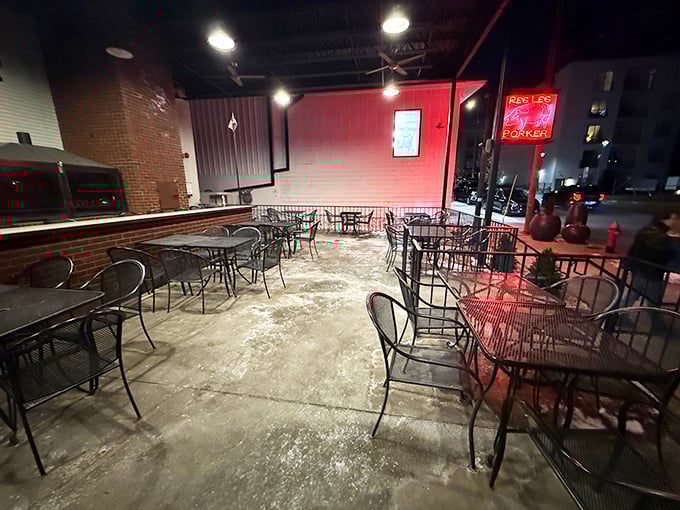 The outdoor patio awaits evening diners, where Nashville nights transform barbecue feasts into memorable urban adventures.